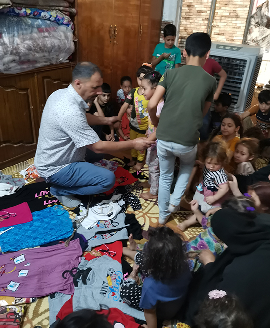 joy of Eid -Distribution of Eid clothing – Al-Rashad – 162 – Nobles ...